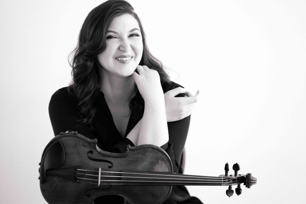 Kira L Hall • Maestra